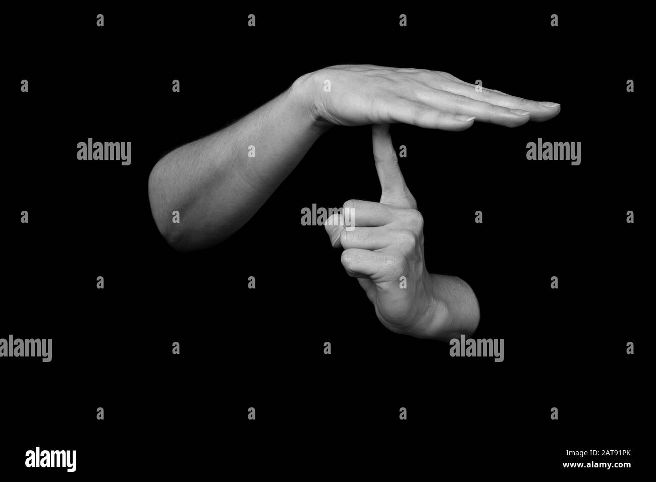 The word DEPRESSION in British sign language on an isolated black ...