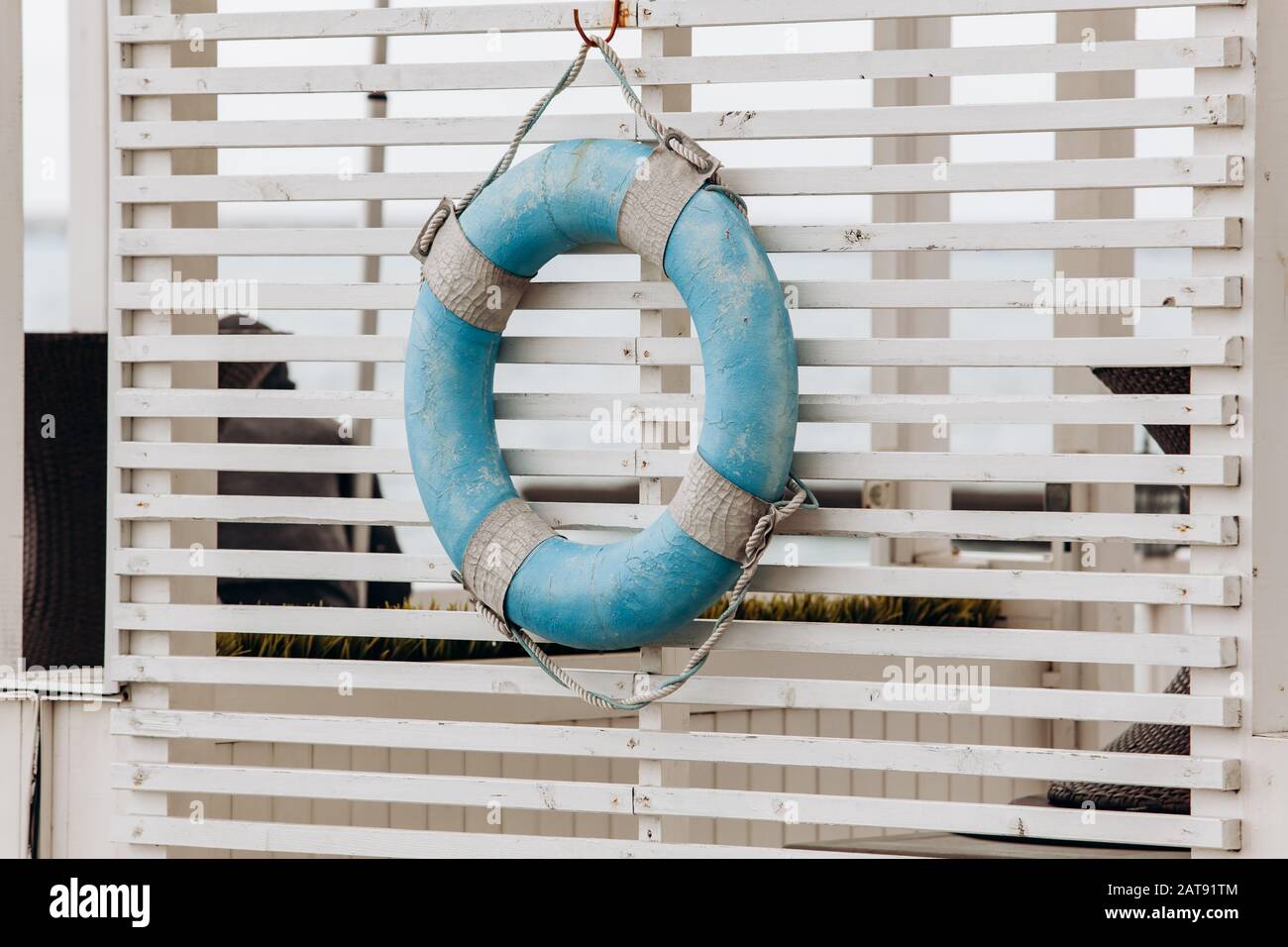 Old blue lifeline on the basis of rescuers. Lifeline to the sea Stock ...