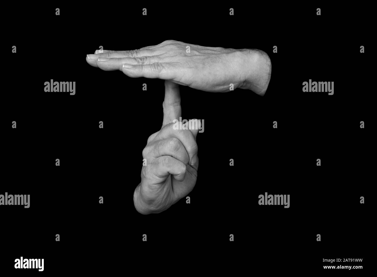 The word DEPRESSION in British sign language on an isolated black ...