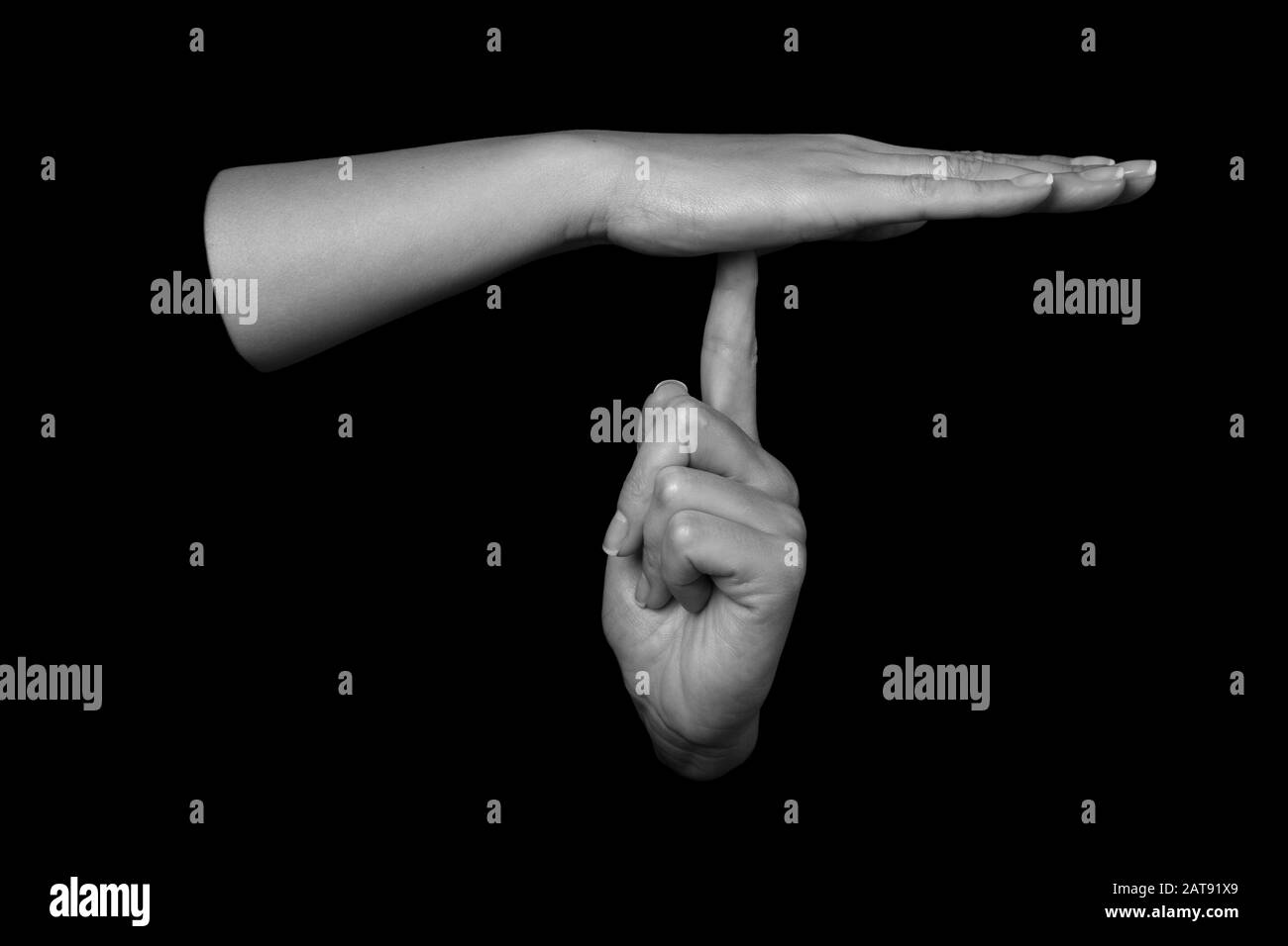 The word DEPRESSION in British sign language on an isolated black ...