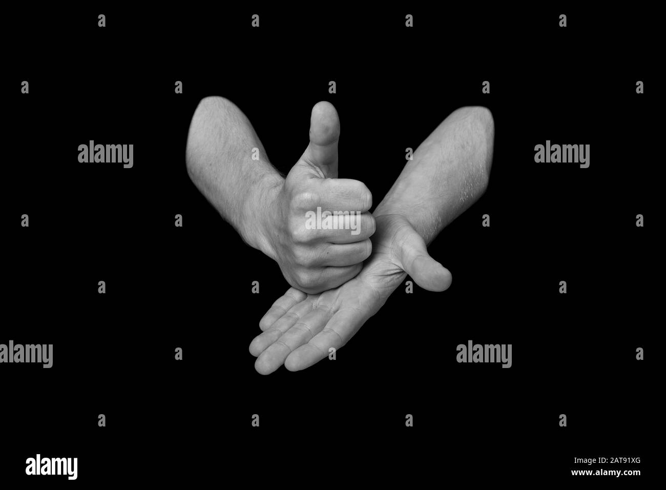 The word HELP in British sign language on an isolated black background ...