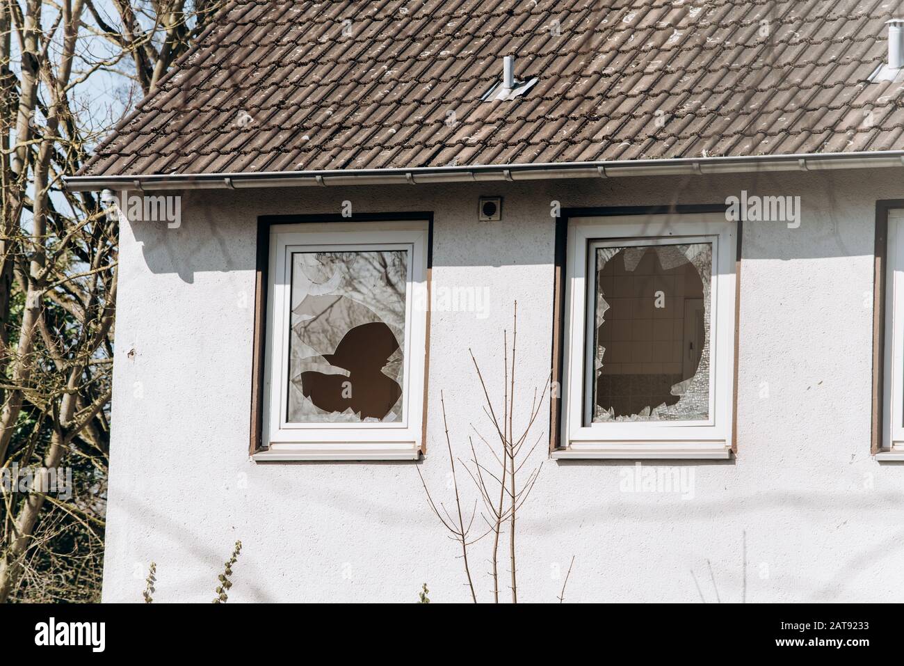Broken Windows in the house. Shards of glass remained in the window ...