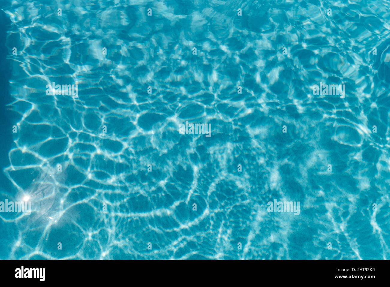 Beautiful refreshing blue swimming pool water. Background of blue water ...