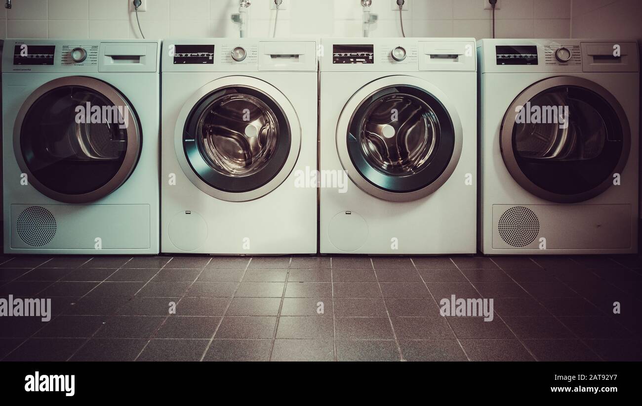 Washing Machines In Launderette. laundry machines Stock Photo - Alamy