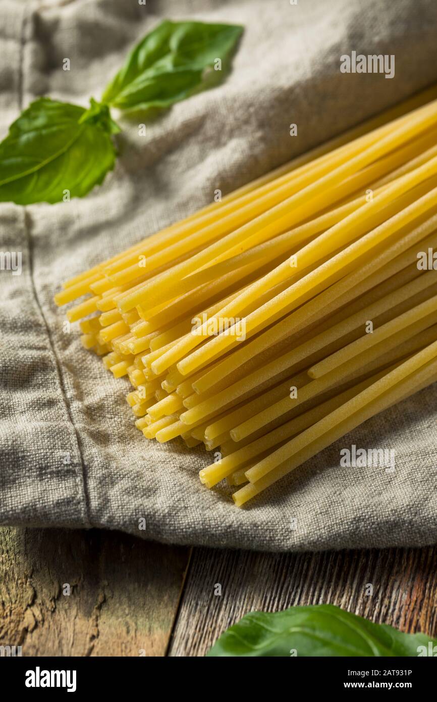 Raw Organic Bucatini Pasta in a Bunch Stock Photo - Alamy