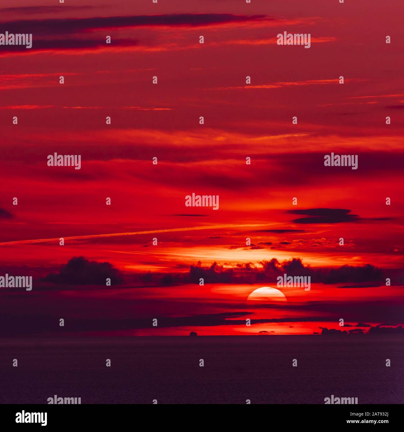 Beautiful sky. red sunlight lighting the clouds softly Stock Photo - Alamy