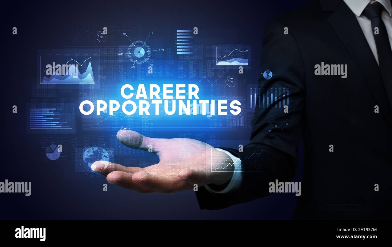 Hand of Businessman holding CAREER OPPORTUNITIES inscription, business ...