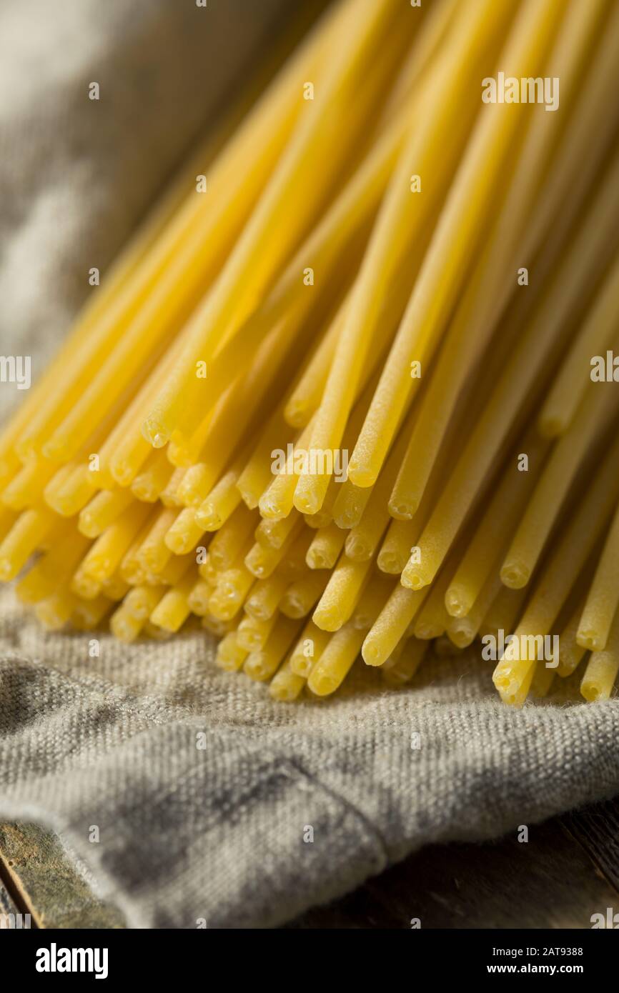 Raw Organic Bucatini Pasta in a Bunch Stock Photo - Alamy