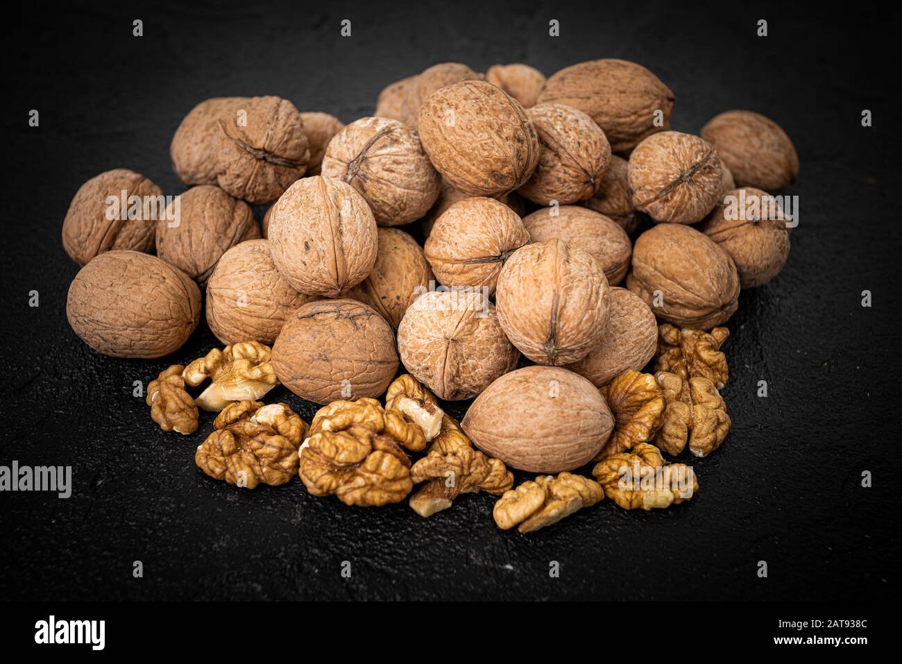 Walnuts on black background. Group walnuts on Healthy organic food ...