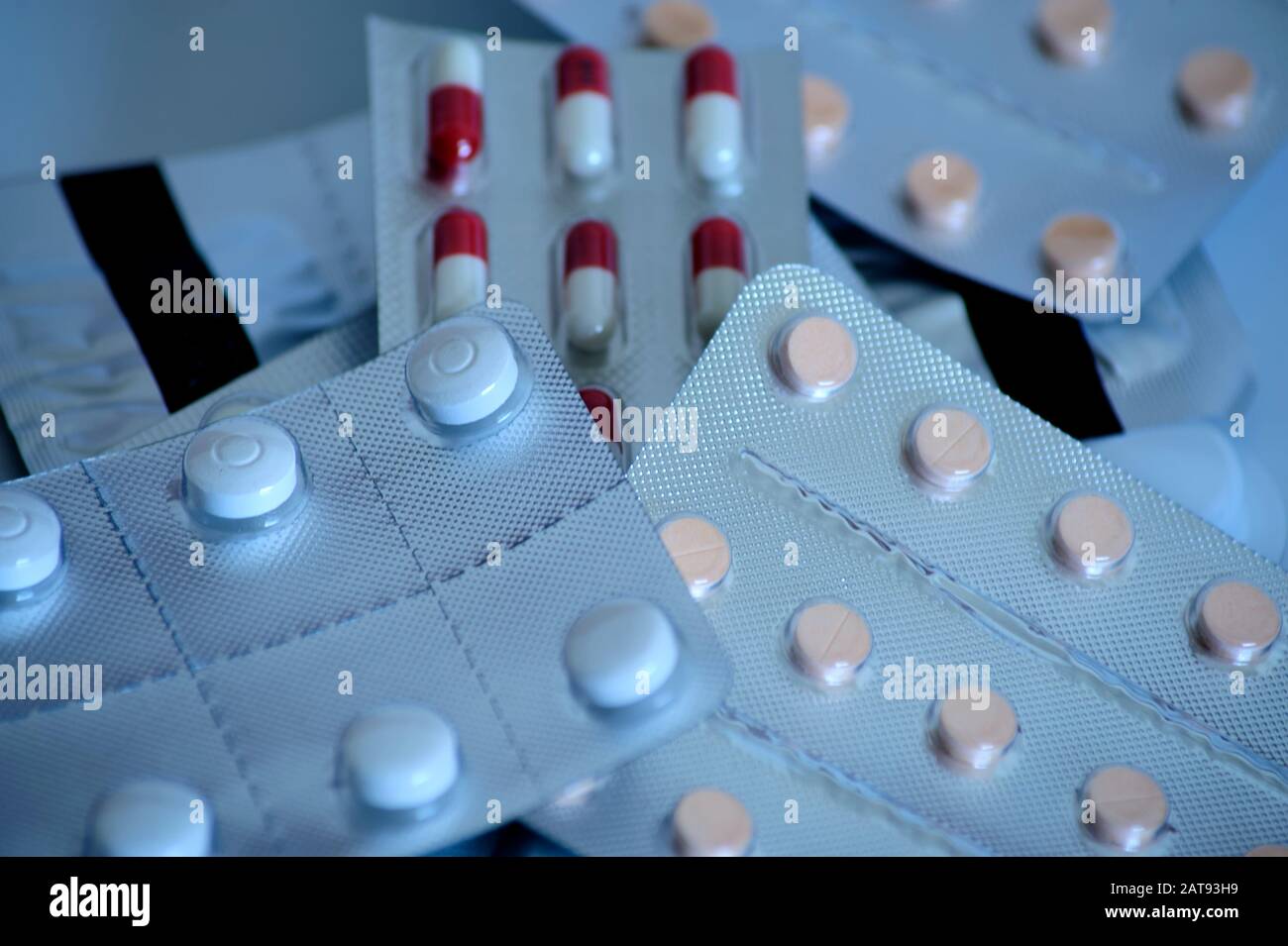 Different packs of medicines in tablet and pills on white surface Stock ...