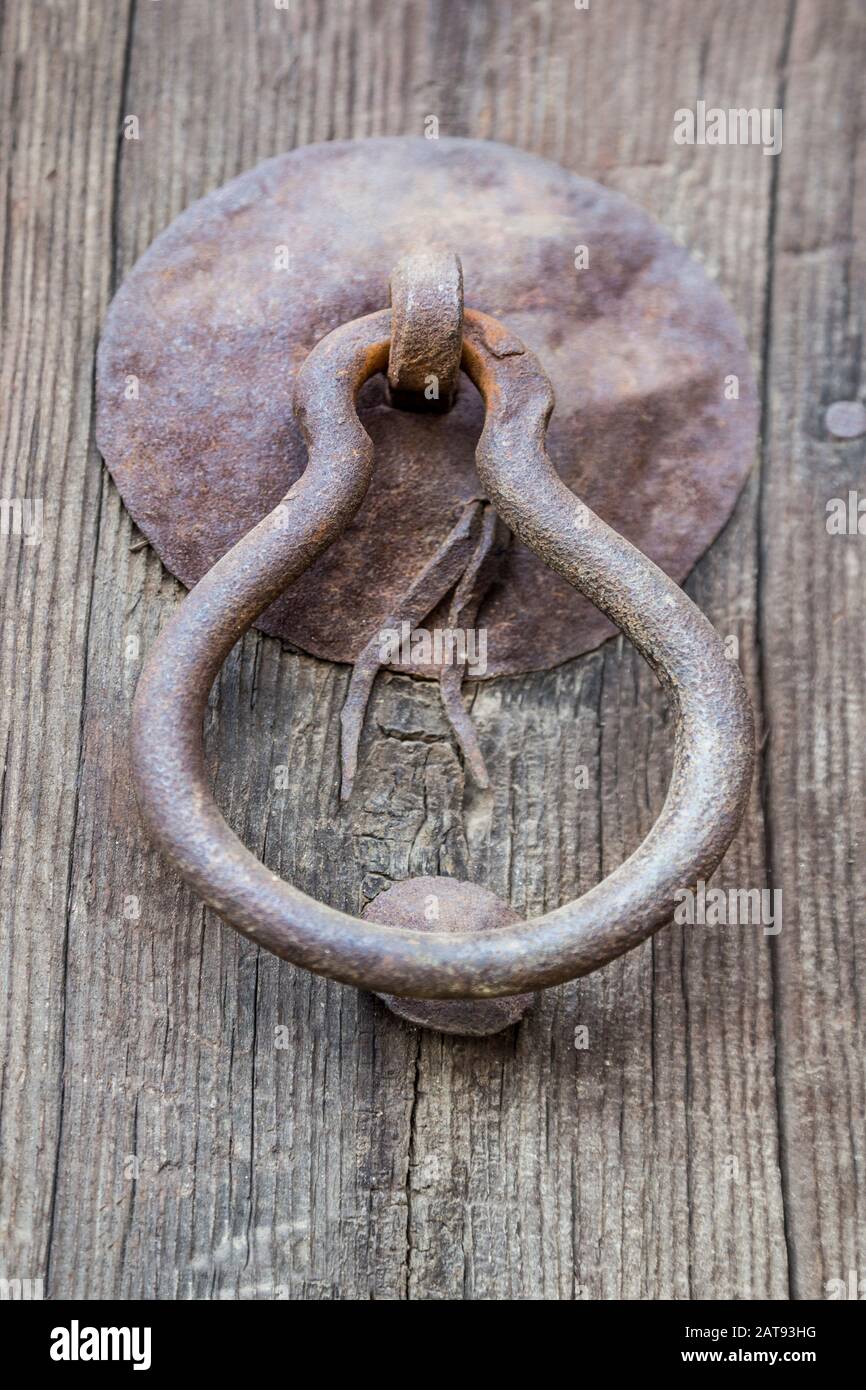 closeup rusty handle of an old wooden door Stock Photo - Alamy