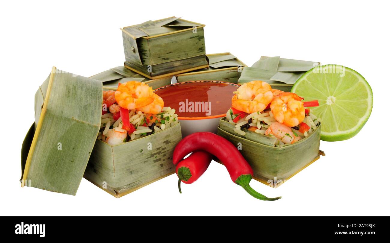 Steamed prawns and rice in bamboo leaf boxes isolated on a white ...