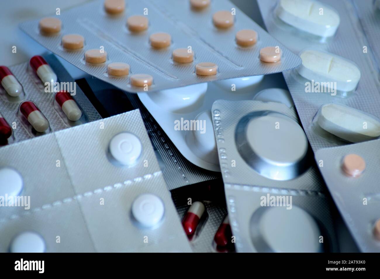 Different packs of medicines in tablet and pills on white surface Stock ...