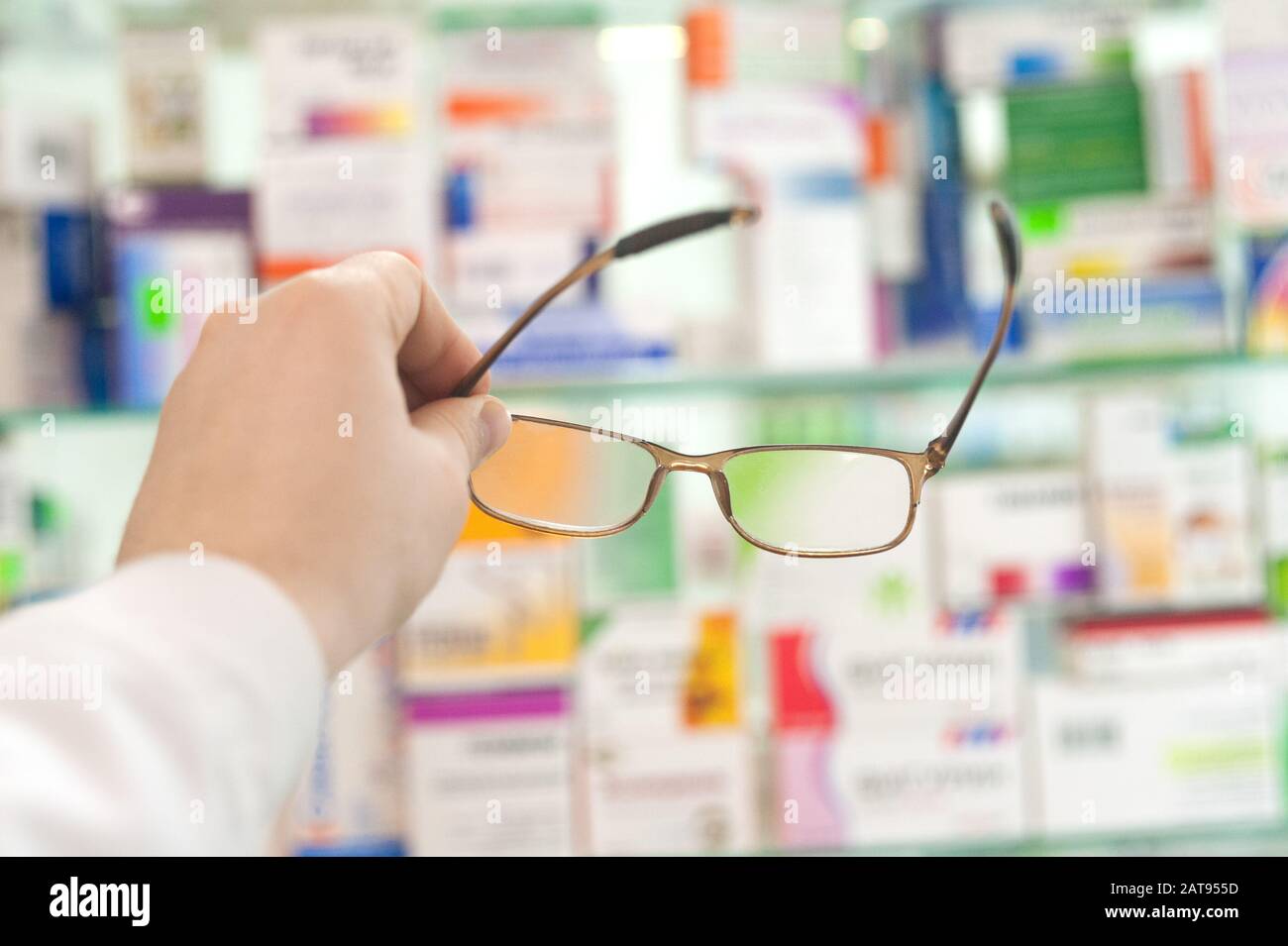 Pharmacy glasses hi-res stock photography and images - Alamy