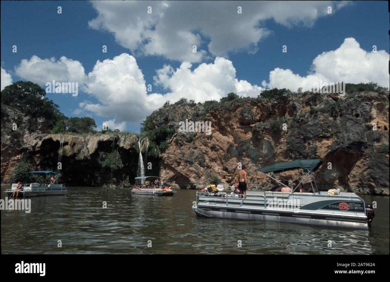 Texas: Pleasure boats at Fall Creek Falls on Lake Buchanan in central ...