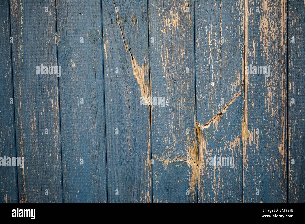 Blue tired looking fence Stock Photo - Alamy