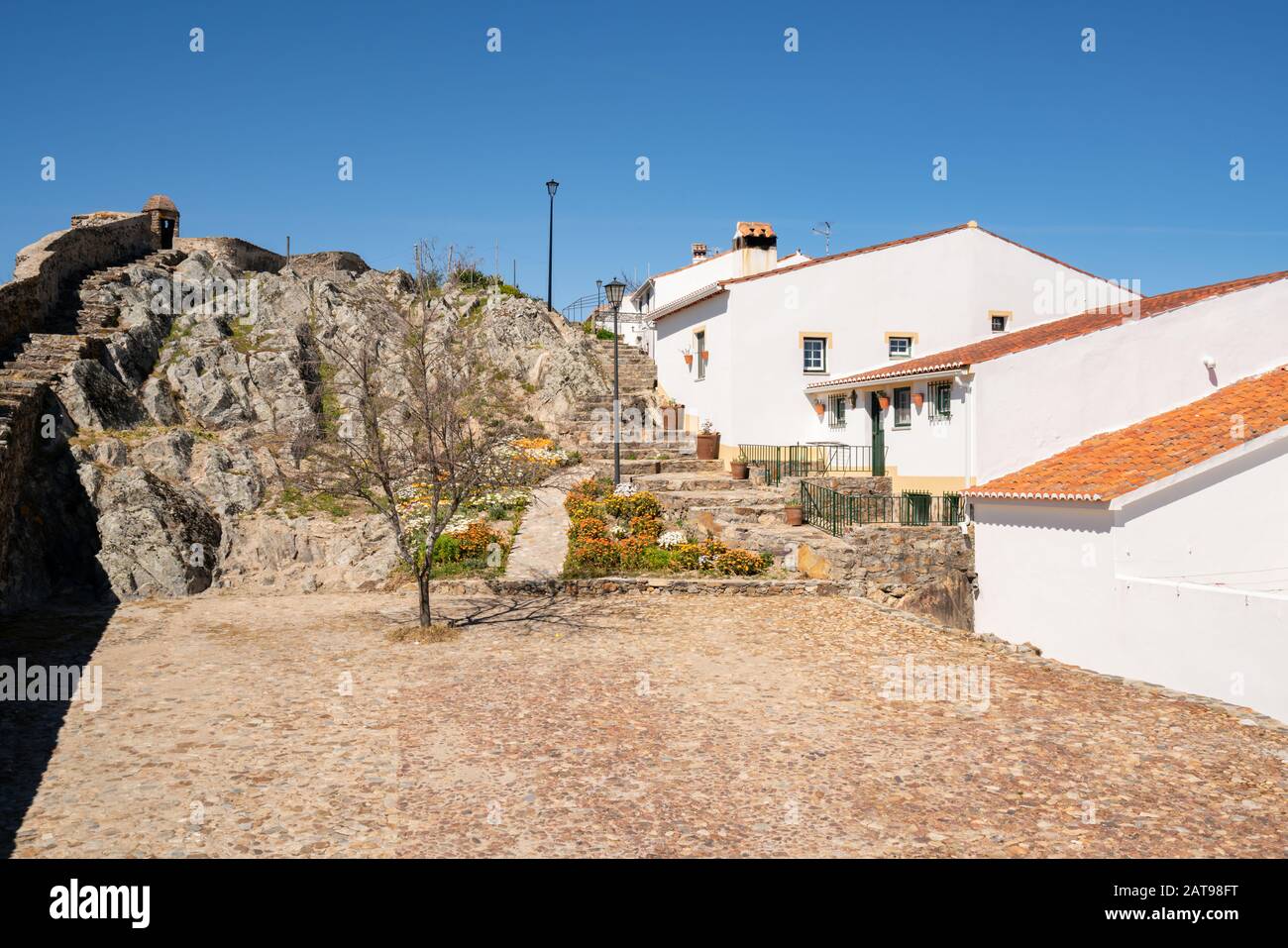 Traditional houses on a beautiful street in Marvao, Alentejo, Portugal ...