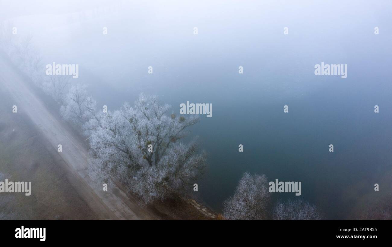 coastline with empty garden plots and yellow autumn trees Stock Photo ...