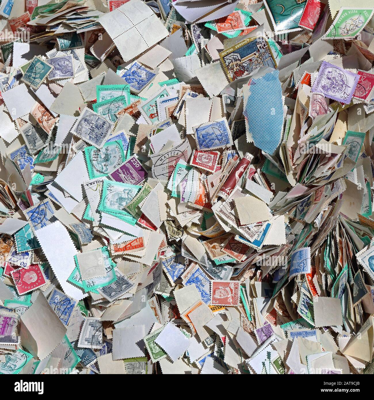 Used Unsorted Postage Stamps at Flea Market Stock Photo - Alamy