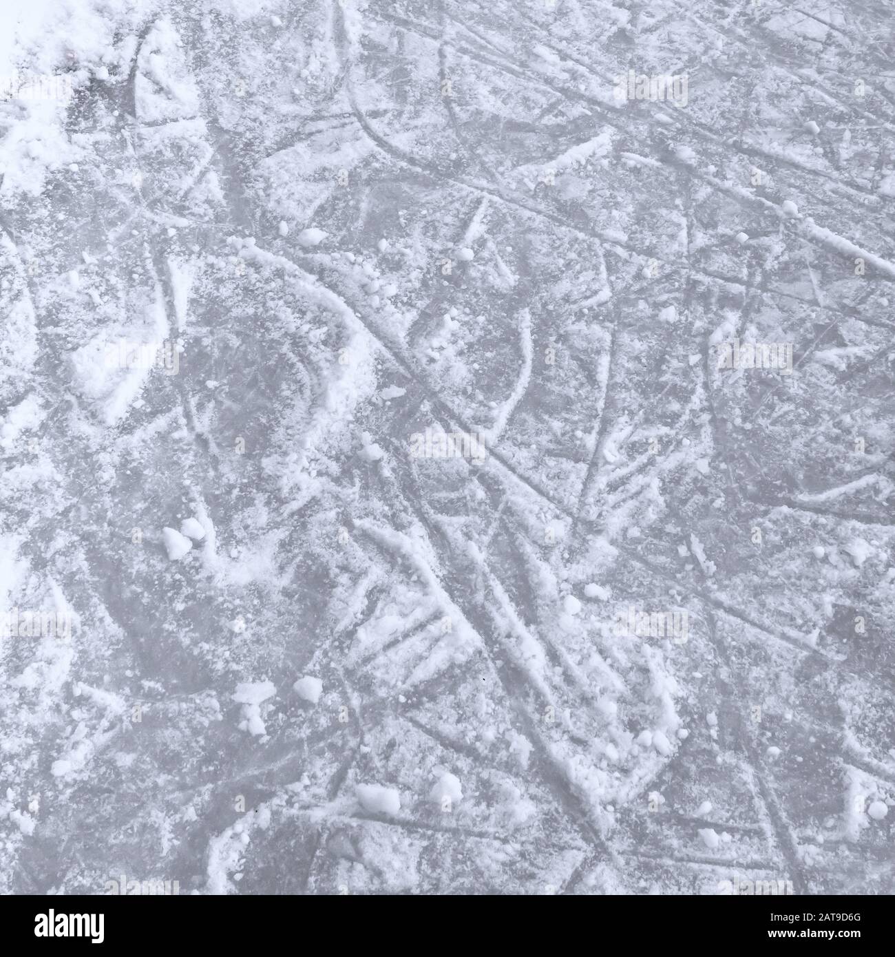 Ice rink floor. Ice background with marks from skating and hockey ...