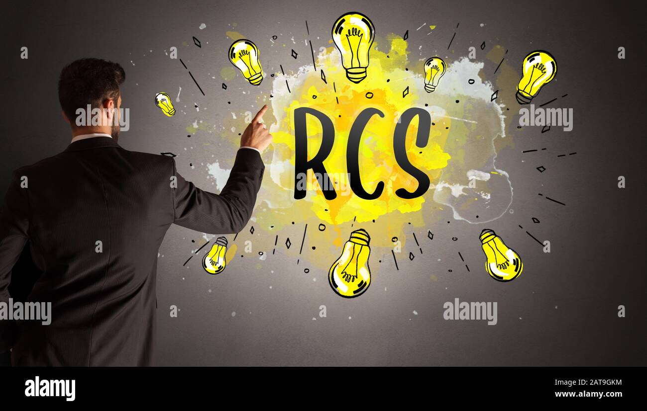 businessman drawing colorful light bulb with RCS abbreviation, new ...