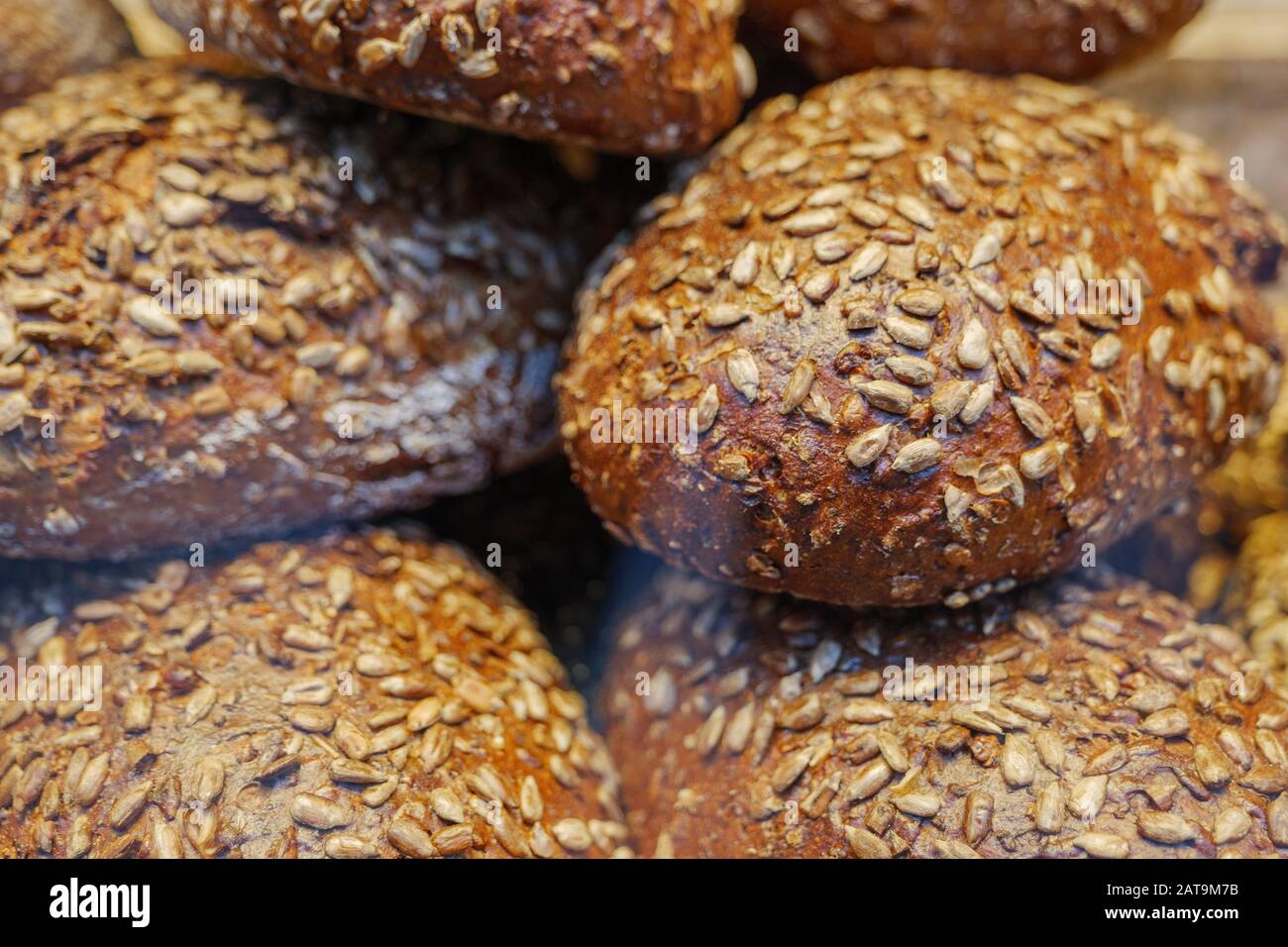 Heap and stack of round rye and wheat mix with various cereal and ...