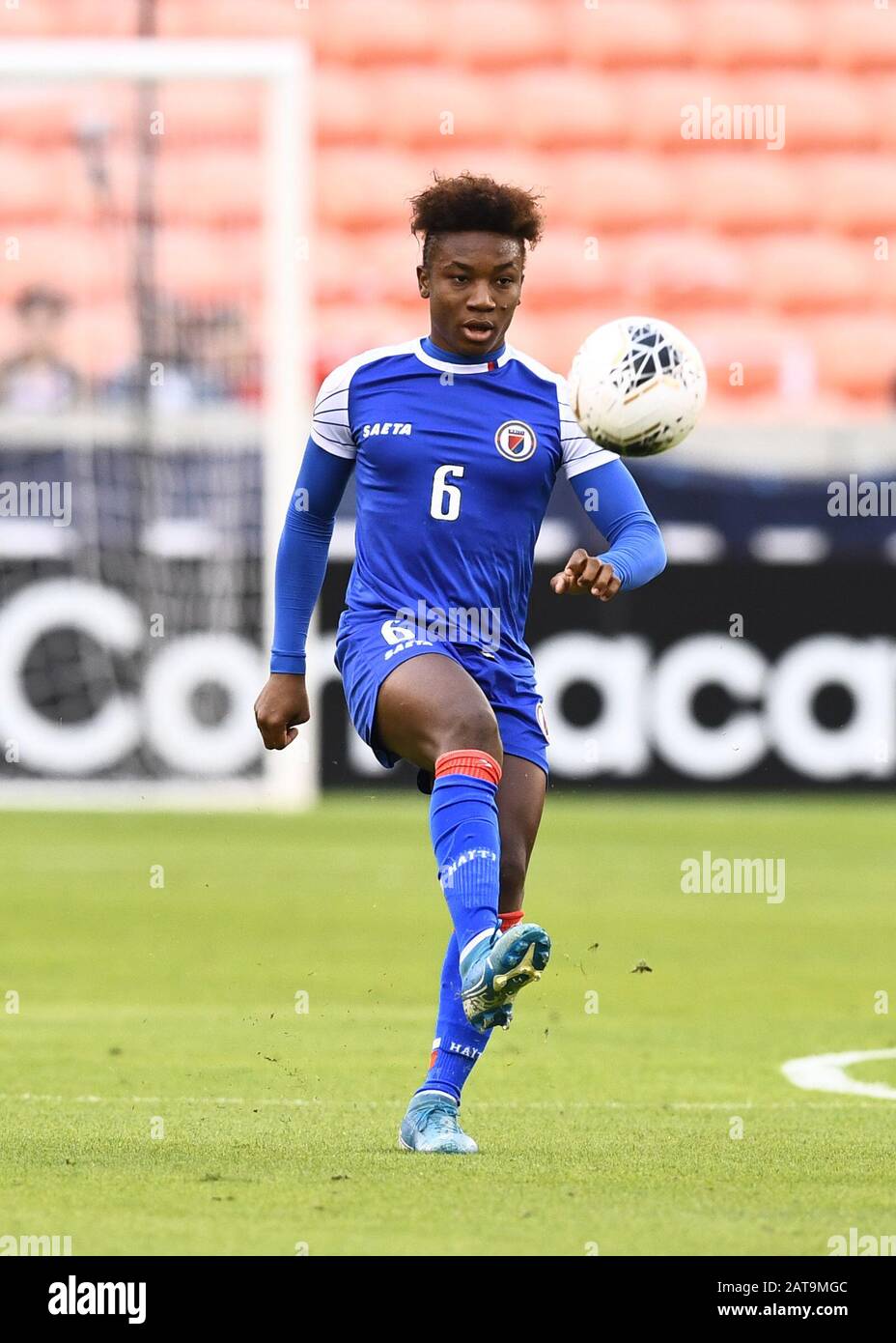 Houston, Texas, USA. 31st Jan, 2020. Haiti midfielder Melchie Dumonay (6) kicks the ball in the ...
