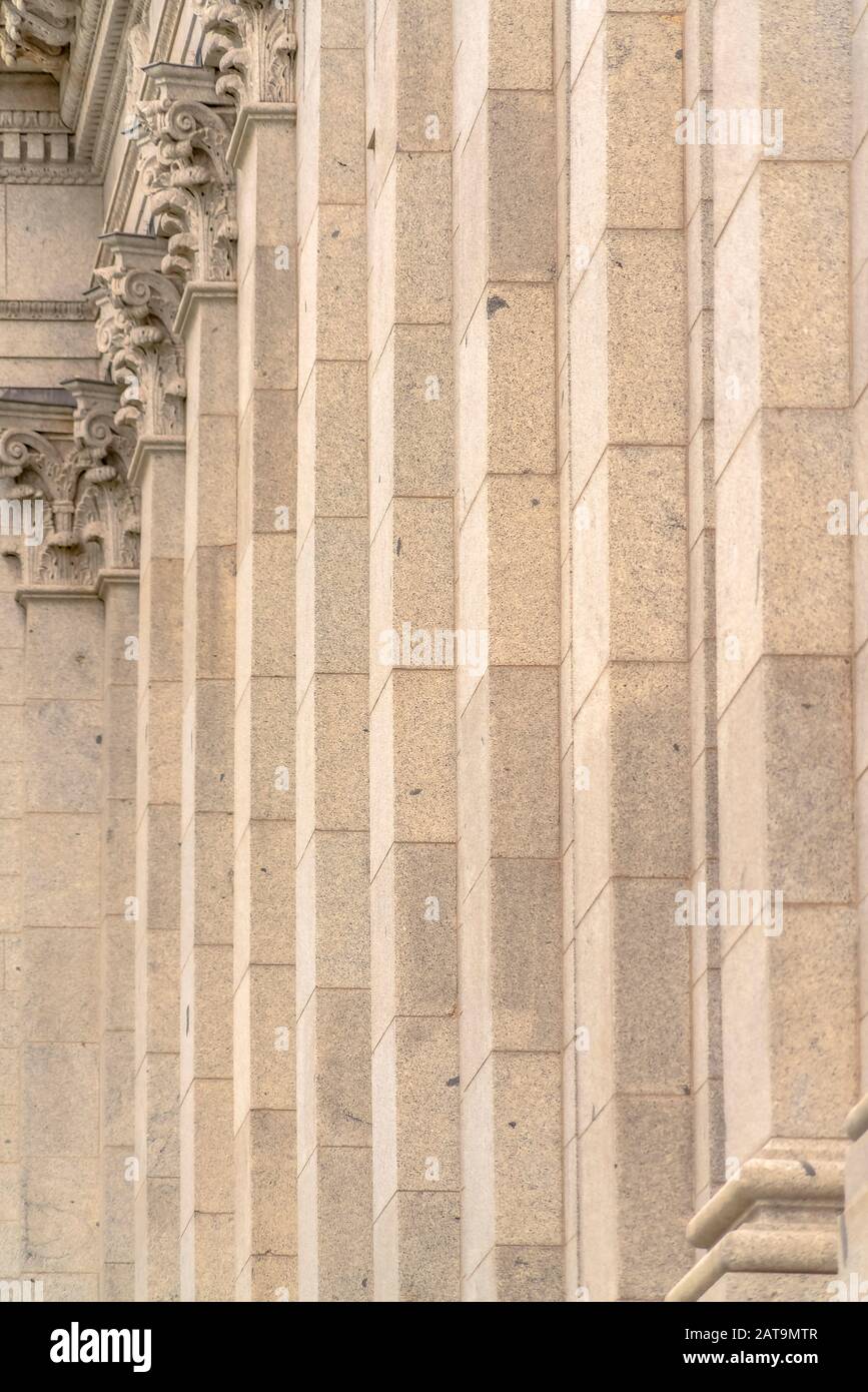 Beautiful building exterior with white stone wall and decorative ...