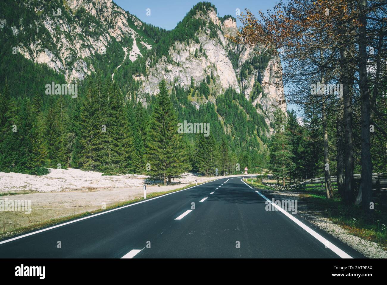 Beautiful mountain road with trees, forest and mountains in the ...