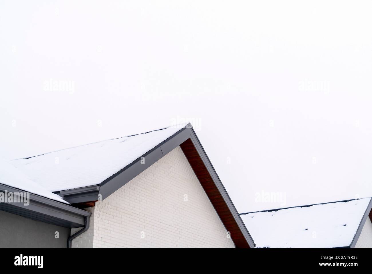 Home exterior with close up view of the gable roof covered with sheet ...