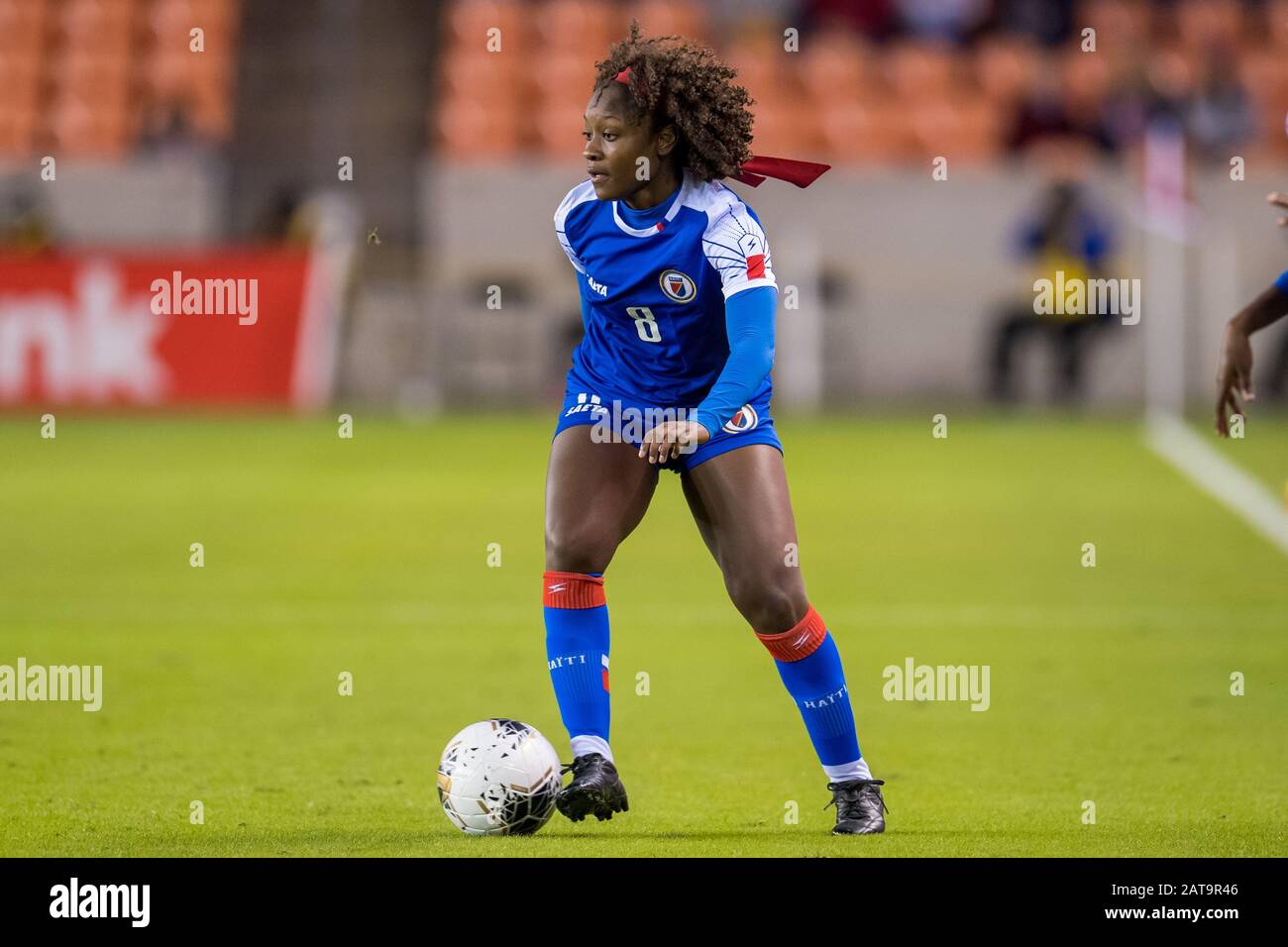 Houston, TX, USA. 31st Jan, 2020. Haiti midfielder Danielle Etienne (8) controls the ball during ...