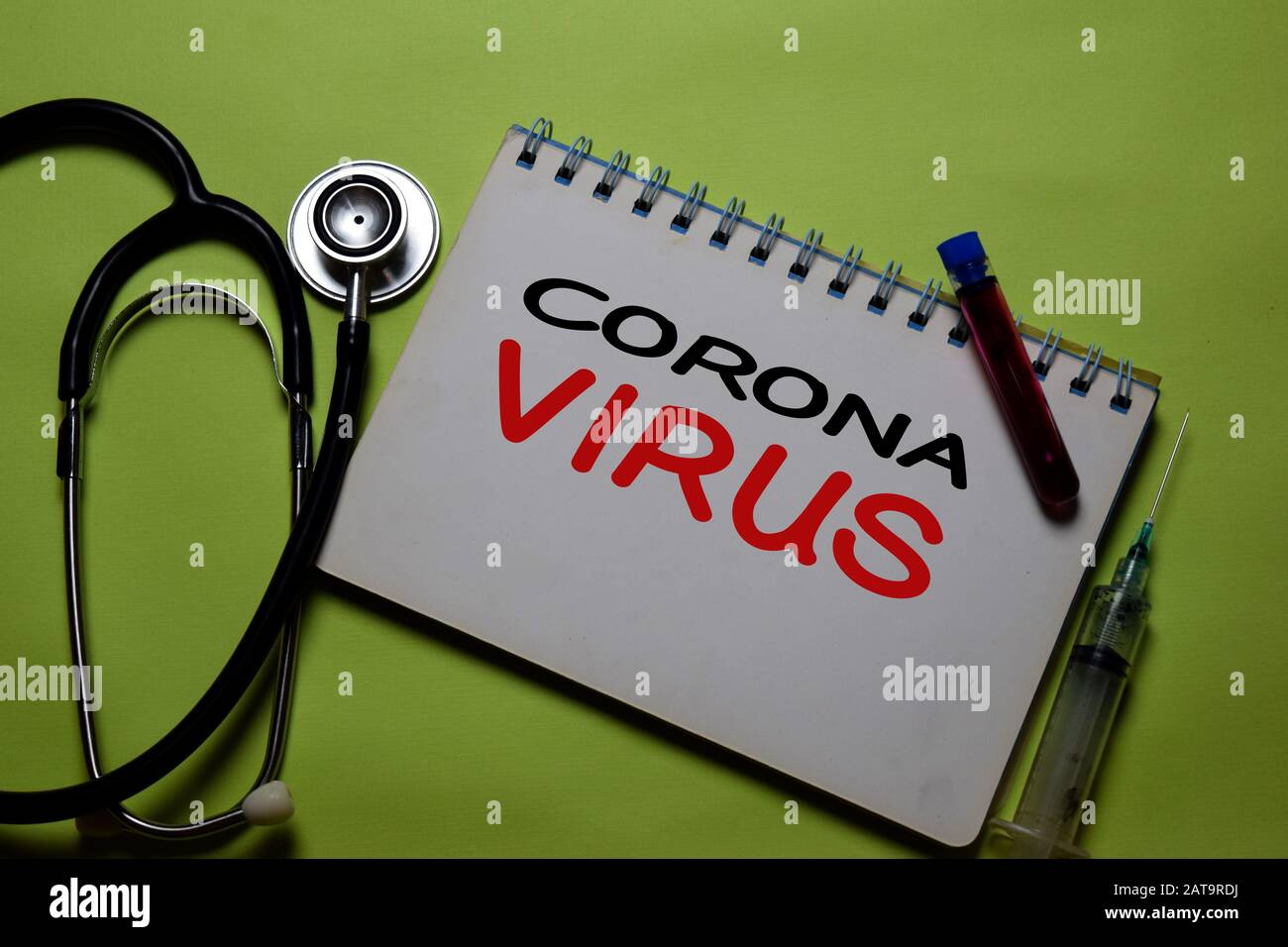 Corona Virus write on a paperwork isolated on Office Desk. Mysterious ...