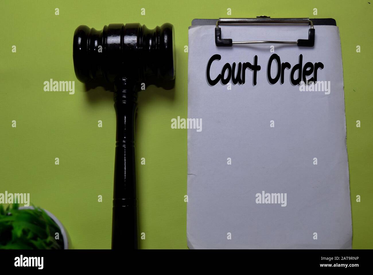 Court Order write on a book with gavel isolated on Office Desk Stock ...