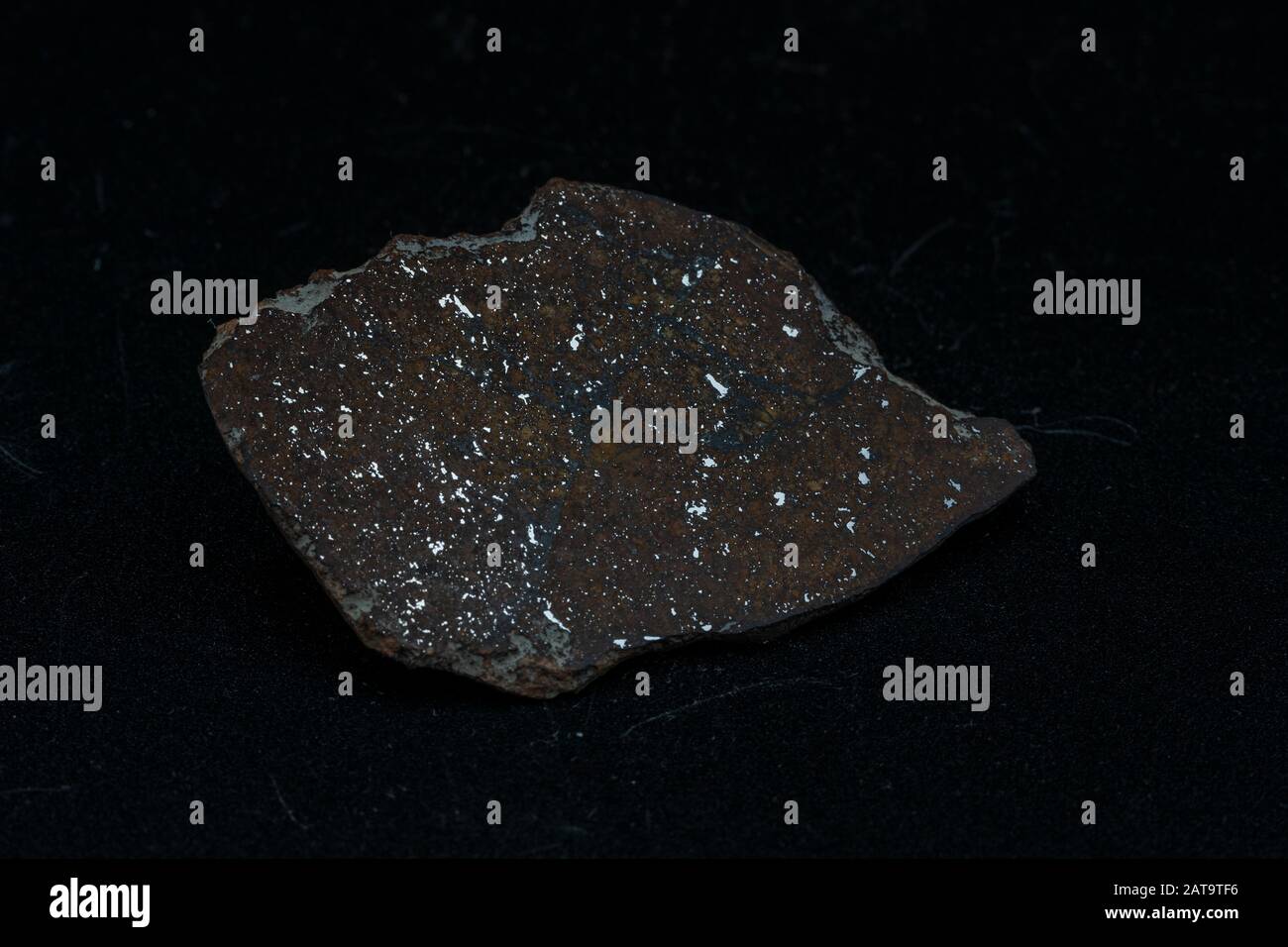 Inside slice of Chondrite Meteorite L Type isolated, piece of rock ...