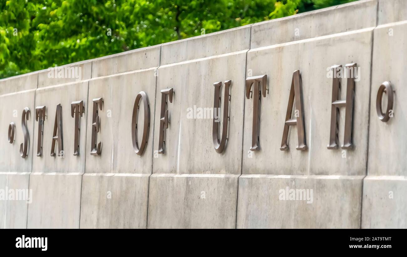 Panorama frame State Of Utah sign mounted on a wall against vibrant ...