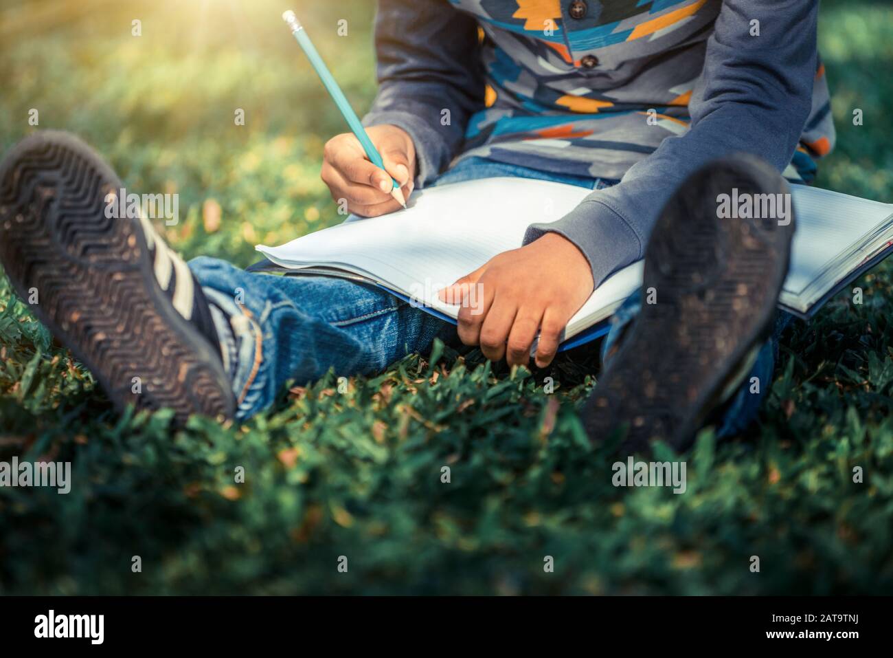 African Boy Writing High Resolution Stock Photography and Images - Alamy