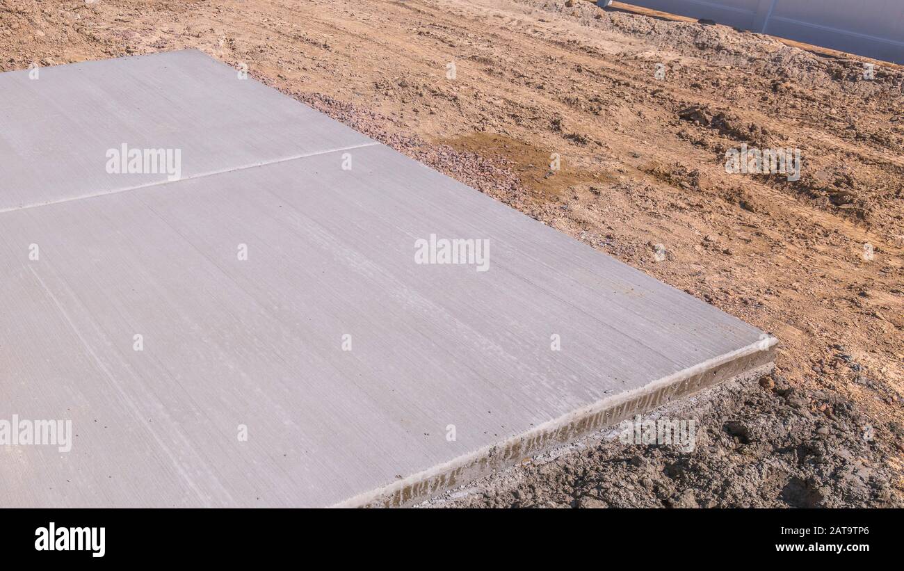 Panorama frame Flat horizontal concrete surface soil at a home under ...