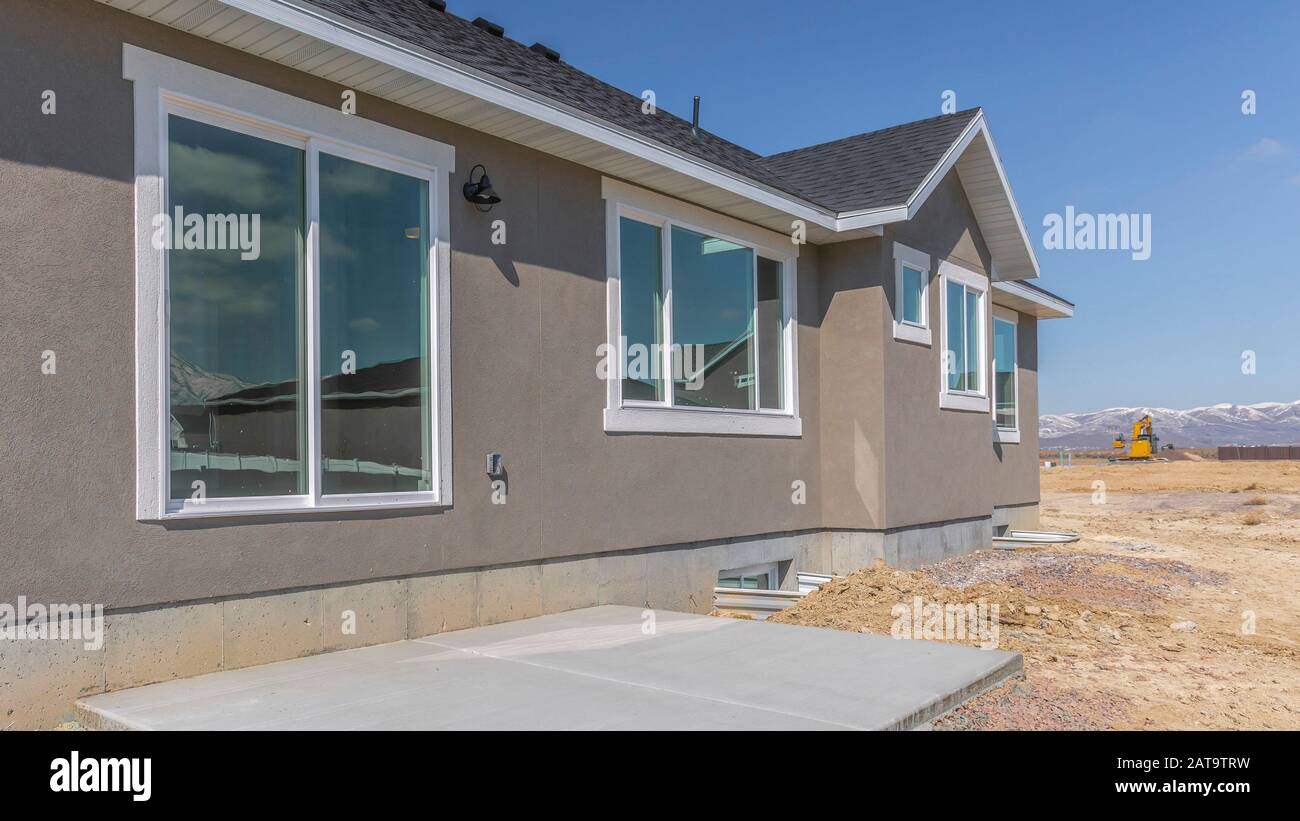 Panorama frame Construction outside a home with flat concrete surface ...