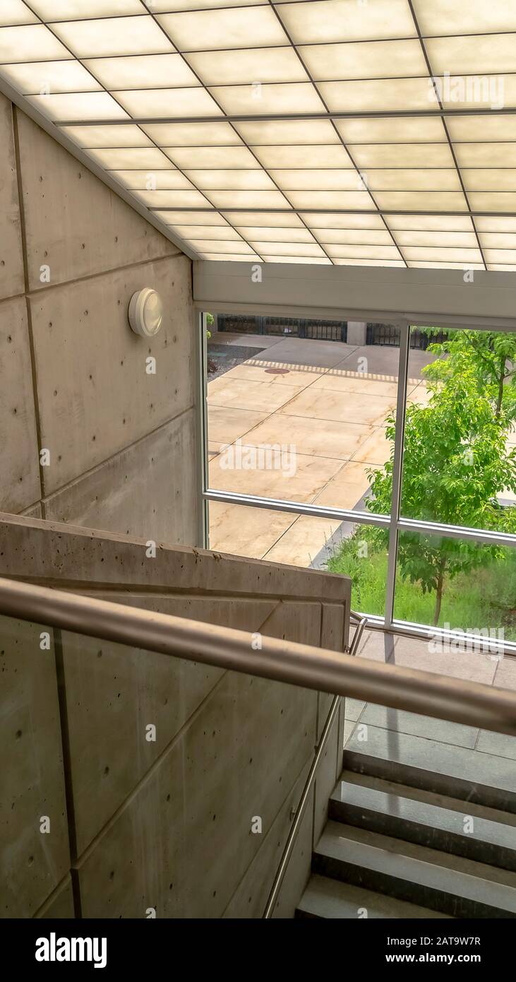 Vertical Flight of stairs of a building with metal handrails and ...