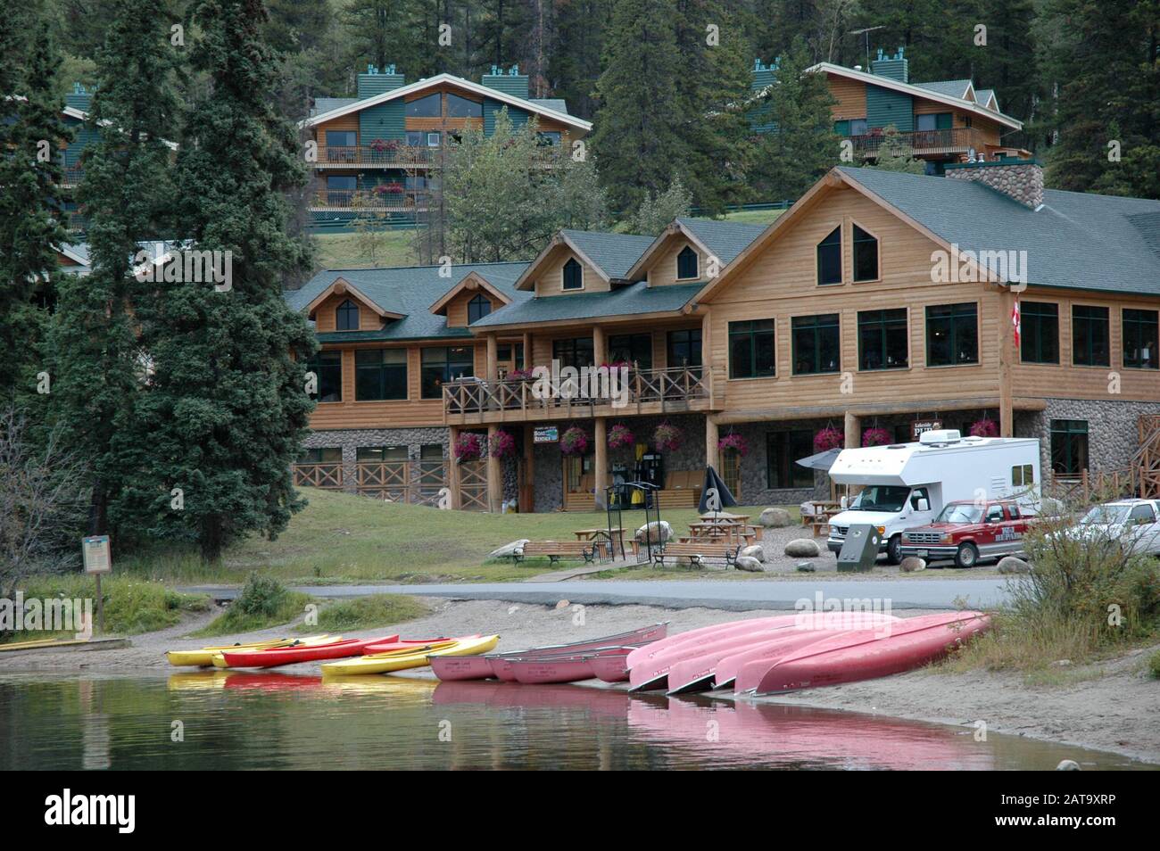 Colourful canoes on the shore of Pyramid Lake with Pyramid Lake Resort ...