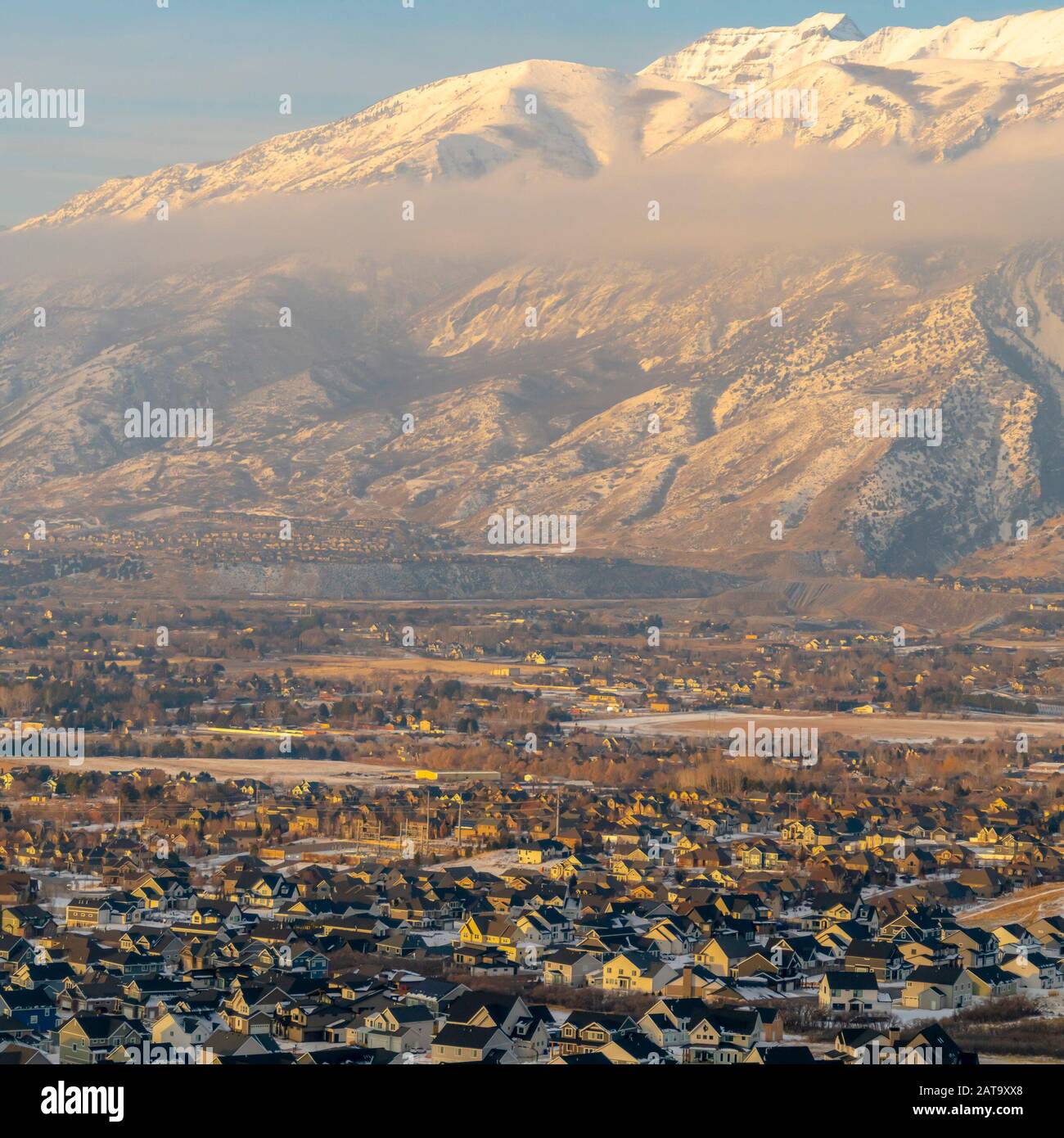 Photo Square Residential houses with amazing scenic view of snowy Mount ...