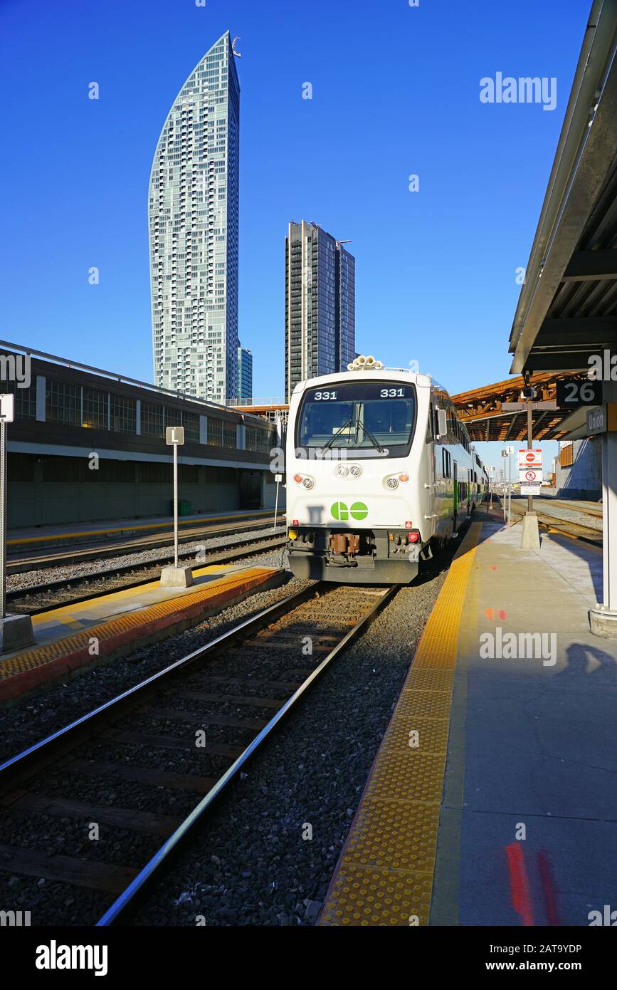 TORONTO, CANADA -26 MAR 2019- View of green and white GO transit ...