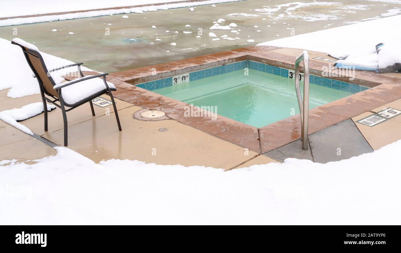 Panorama frame Childrens pool and frozen adult swimming pool surrounded ...