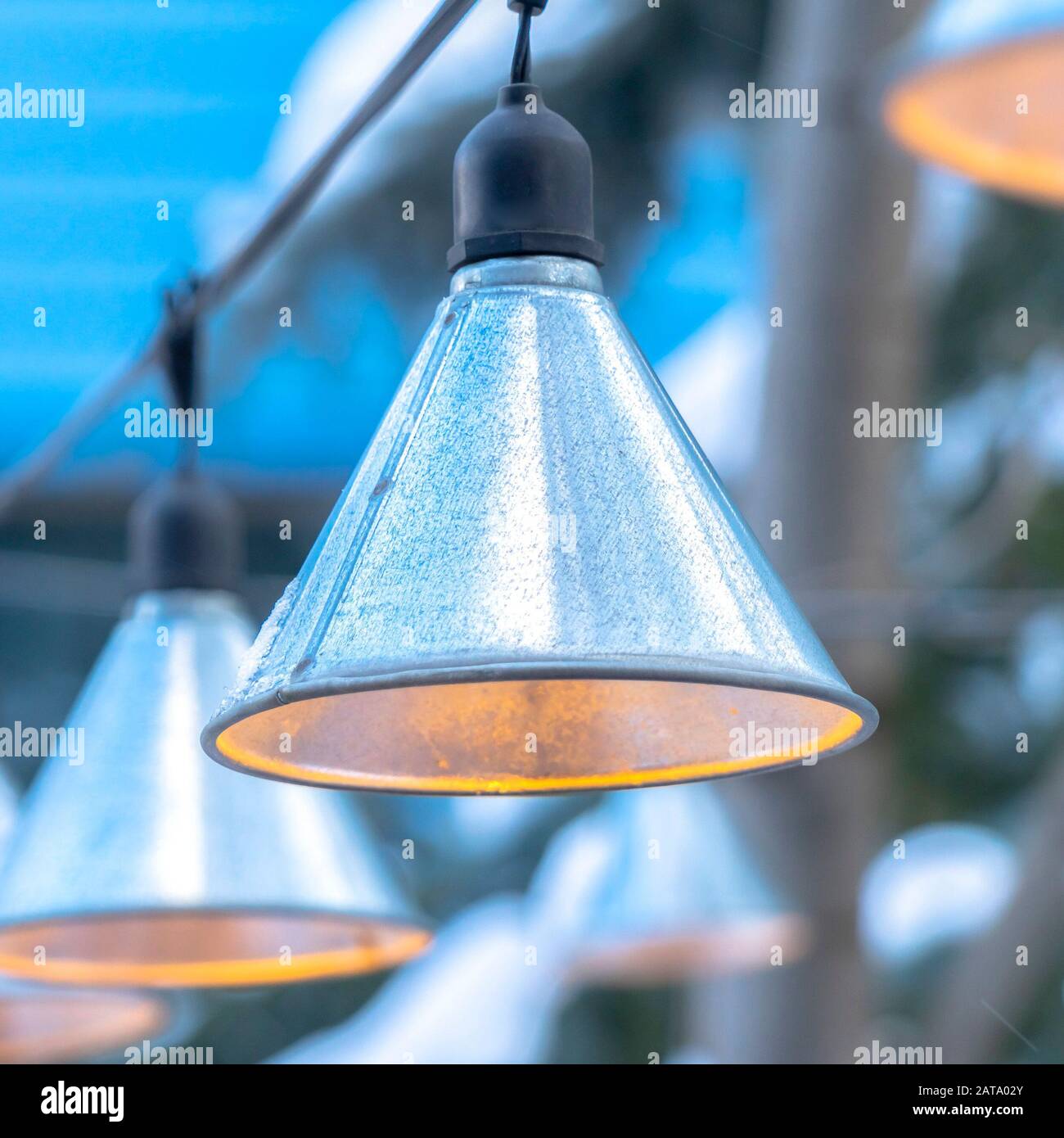 Square Decorative outdoor string lights with home and sky in the blurry ...