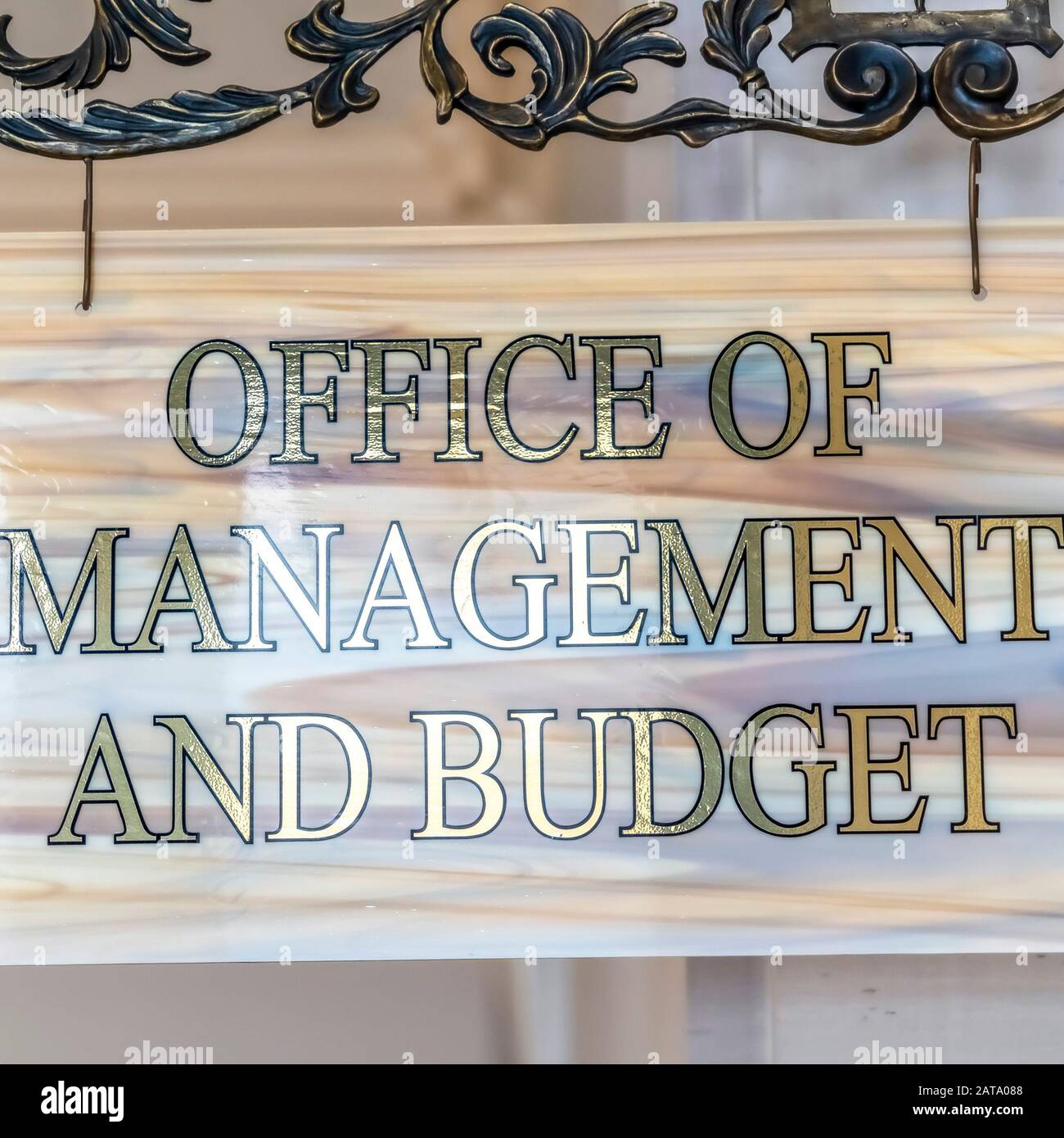 Square frame Office Of Management And Budget sign hanging on decrative ...