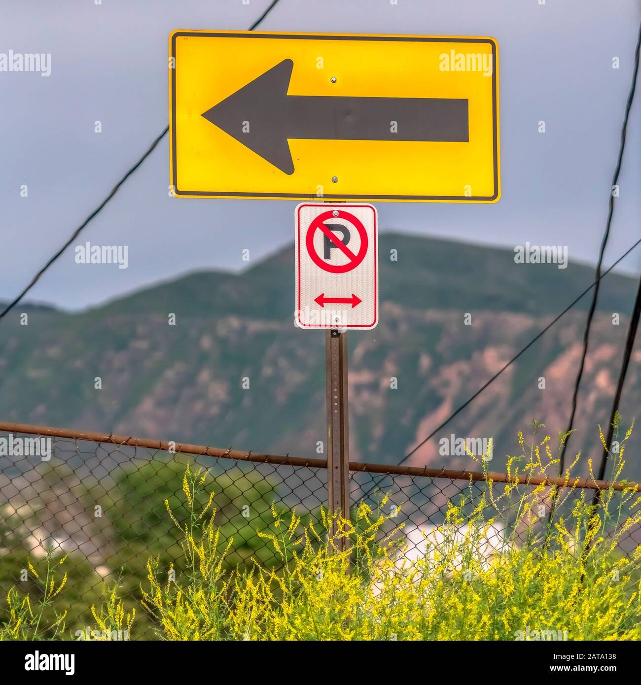 Square frame No Parking On Both Sides and directional arrow signs ...