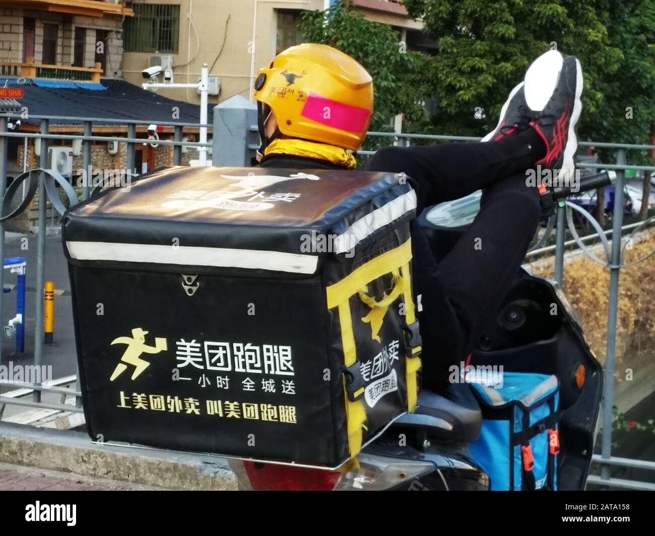 Boy delivery logistics hi-res stock photography and images - Alamy