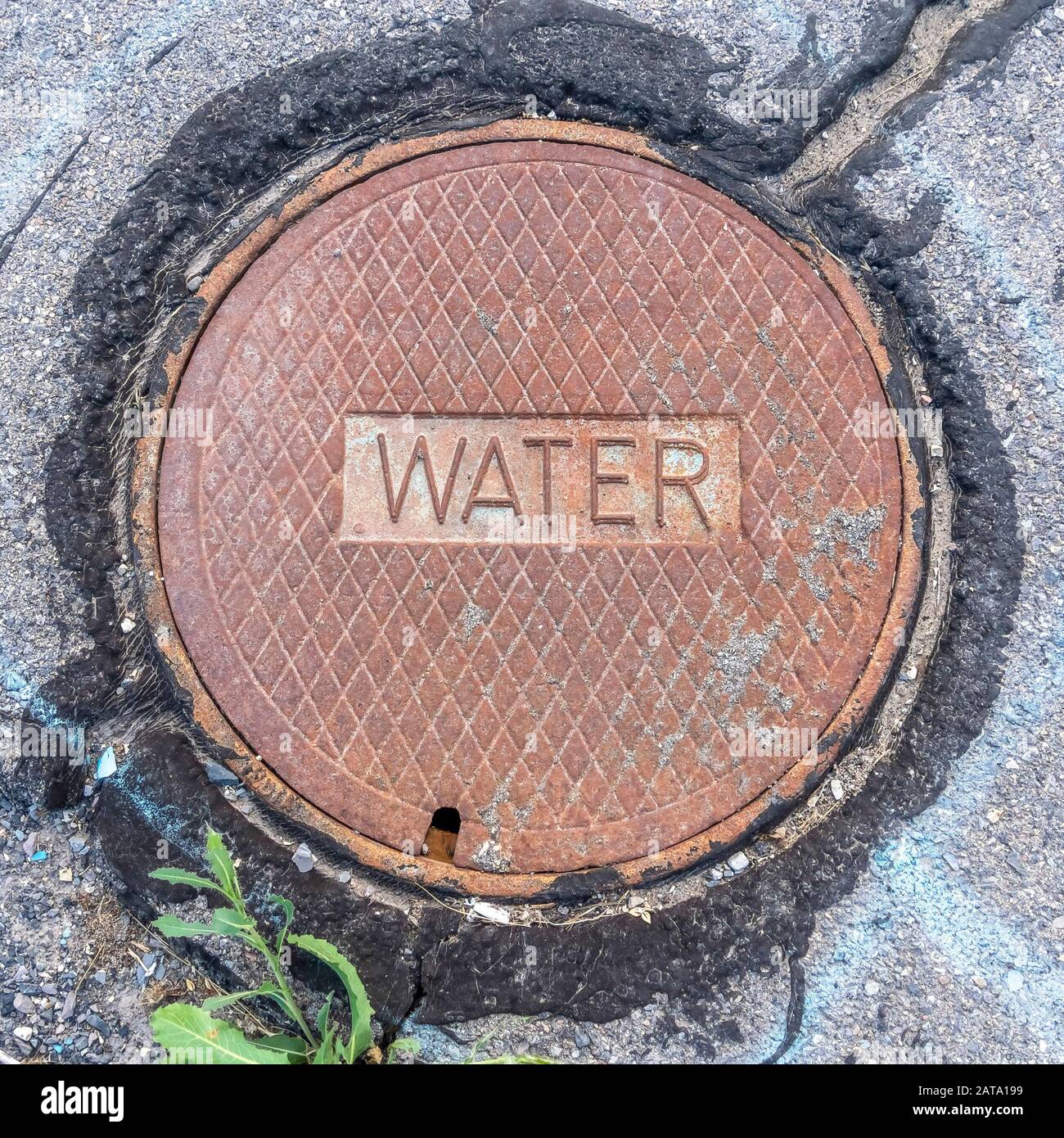 Square Removable circular water supply manhole cover against road and ...