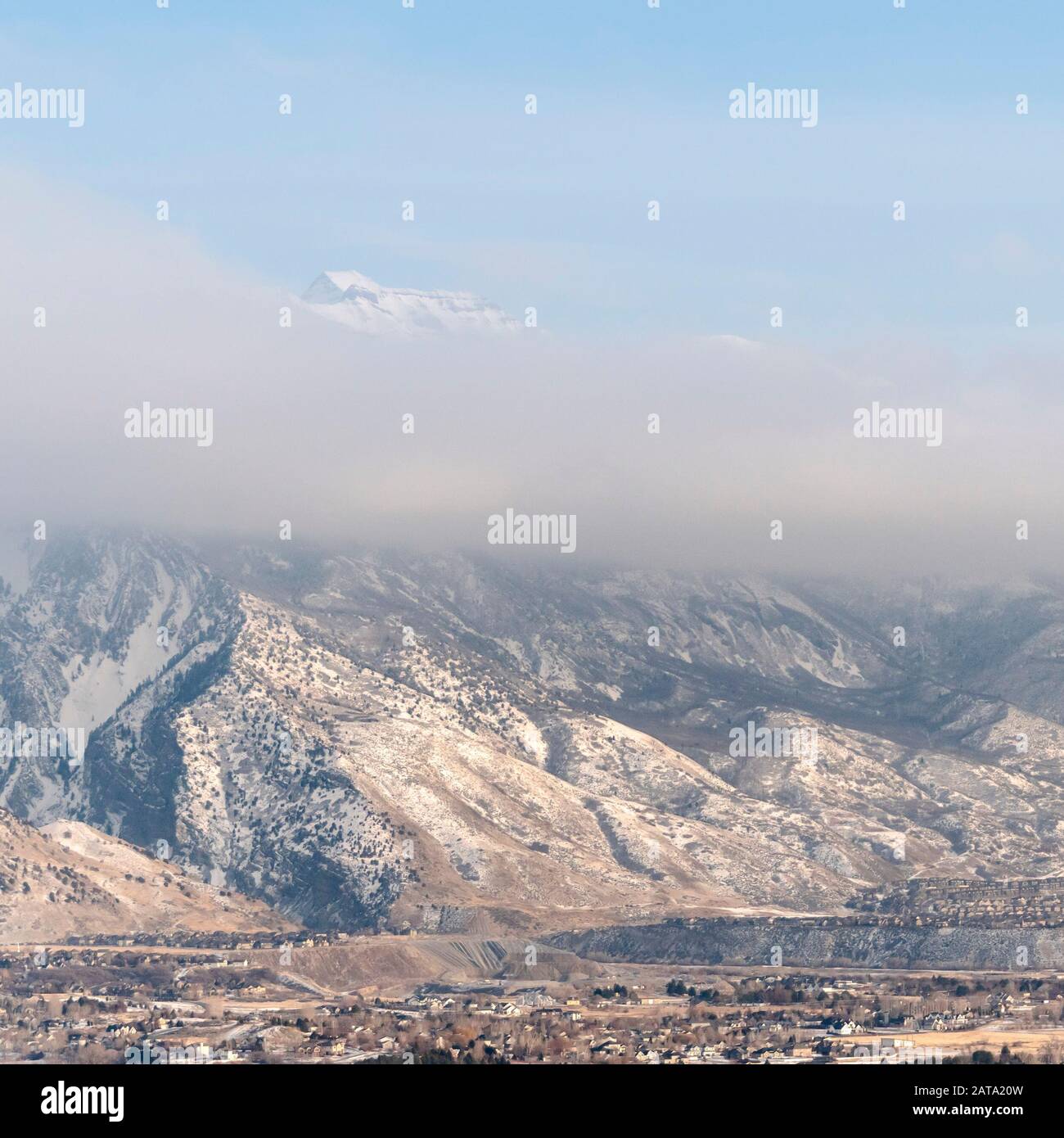 Square Houses in the suburbs surrounded by striking mountain scenery ...