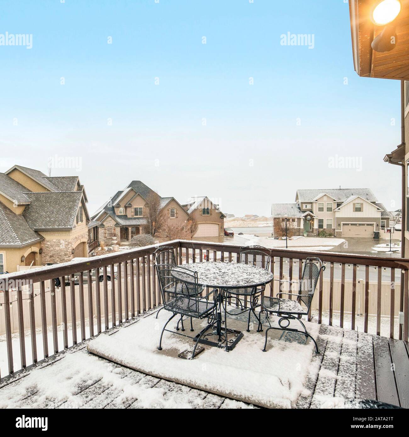 Square Snowy deck overlooking homes in the village blanketed with snow in winter Stock Photo - Alamy